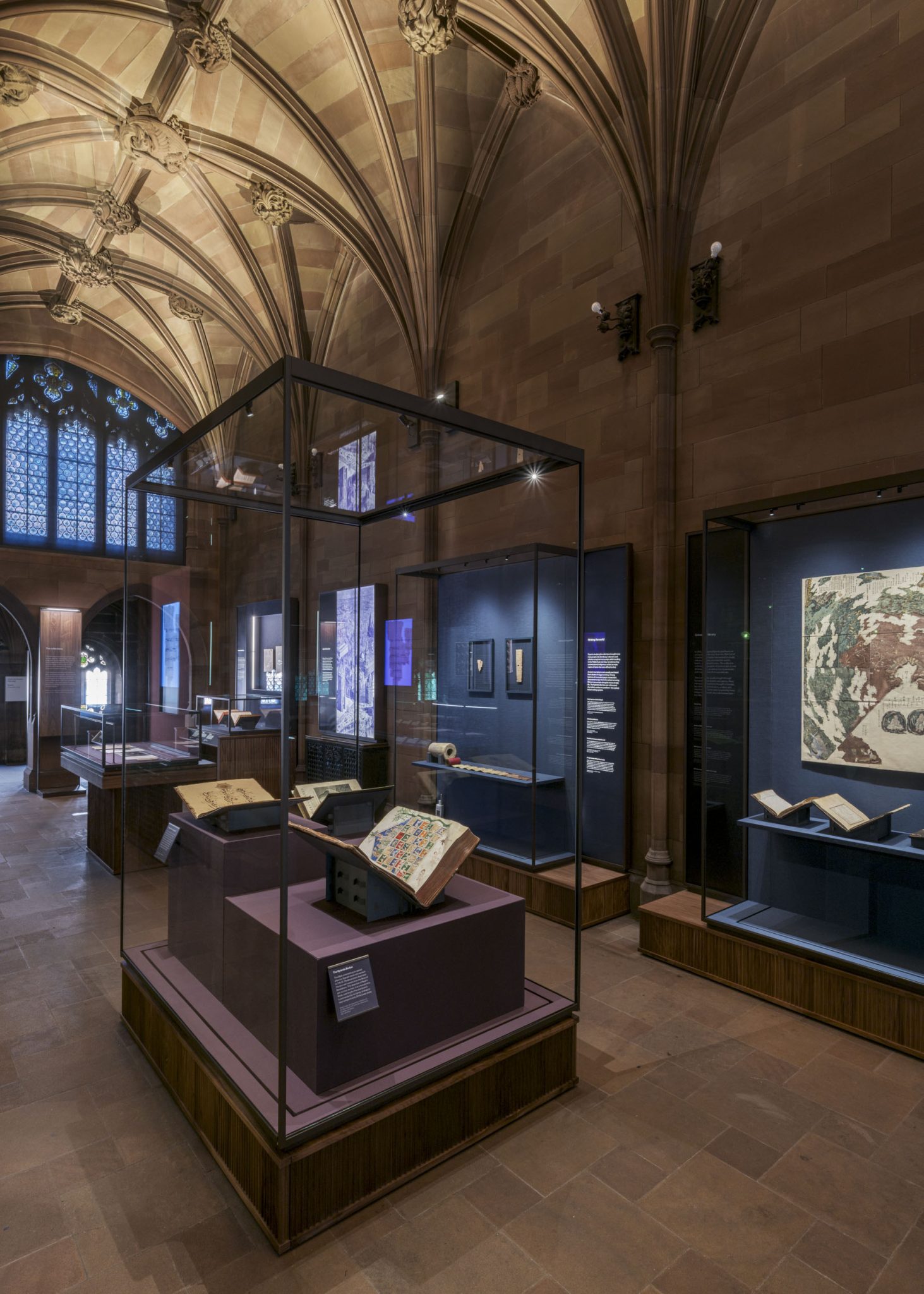 17 – Full-height vitrines allow for the display of objects such as maps ...